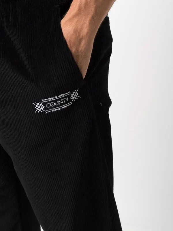 COUNTY OF MILAN Corduroy Embroidered Logo Trousers - Black