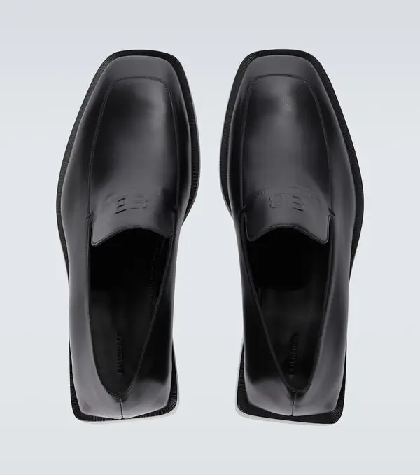 Balenciaga Coin Rim Leather Loafers - Black | Editorialist display picture 1