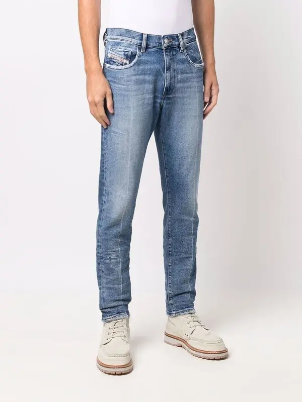 DIESEL® Whiskering Effect Slim-fit Jeans