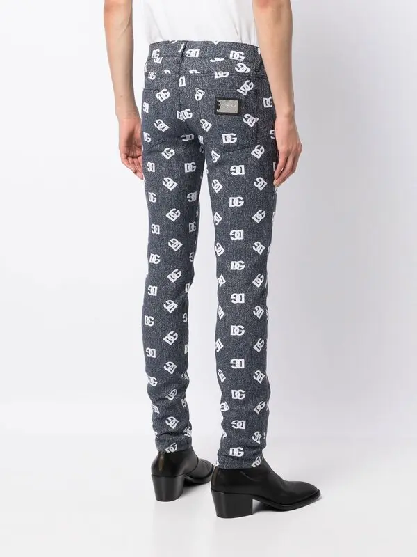 Dolce & Gabbana Slim-cut Monogram-print Jeans - Blue