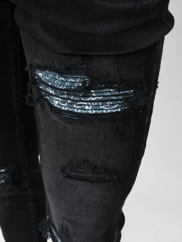 Amiri Distressed Skinny Jeans