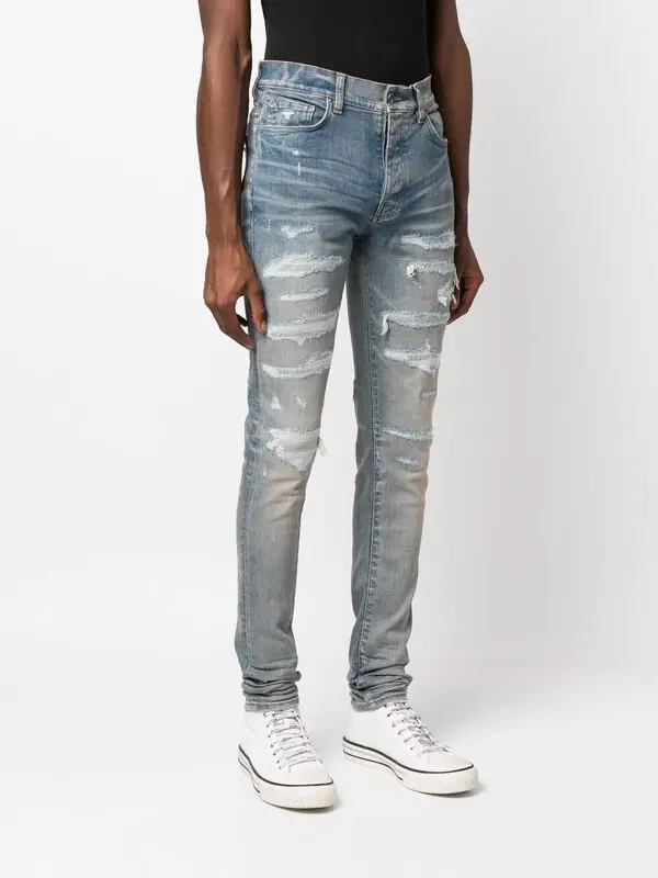 Amiri Distressed Skinny Jeans