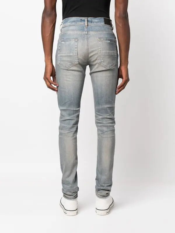Amiri Distressed Skinny Jeans