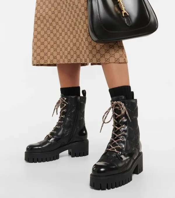 Gucci Gg Quilted Leather Lace-Up Boots - Black | Editorialist display picture 2
