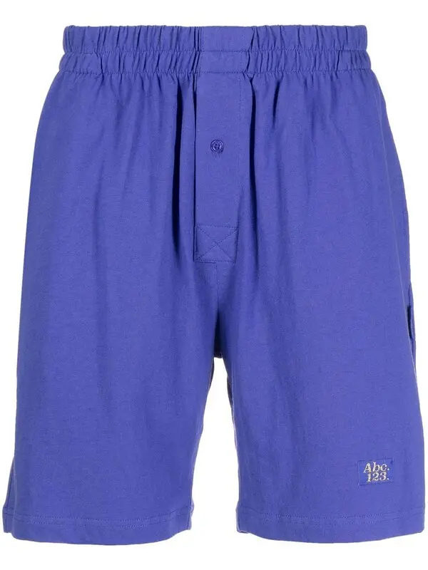 ADVISORY BOARD CRYSTALS Logo Print Lounge Shorts - Purple