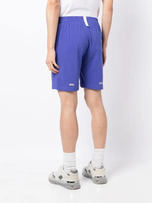 ADVISORY BOARD CRYSTALS Logo Print Lounge Shorts - Purple