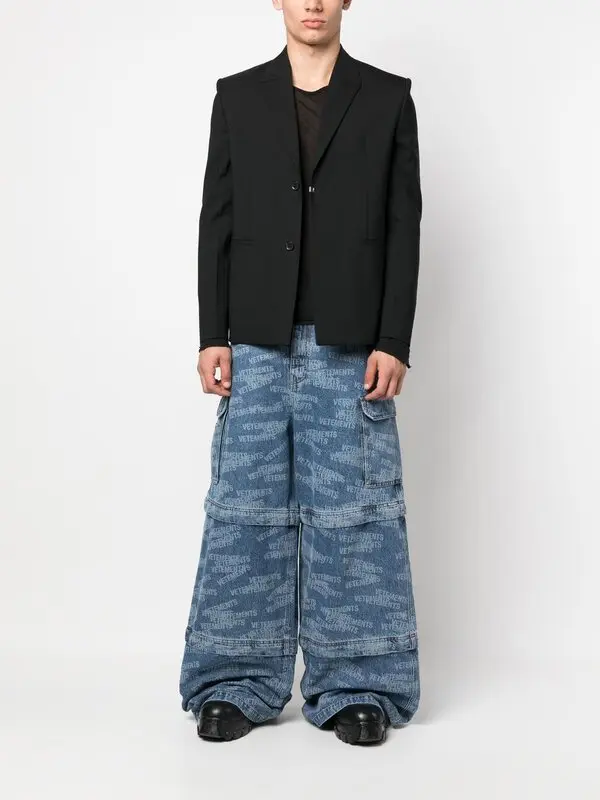 Vetements Logo-Print Transformer Jeans In Blue - 30% Off