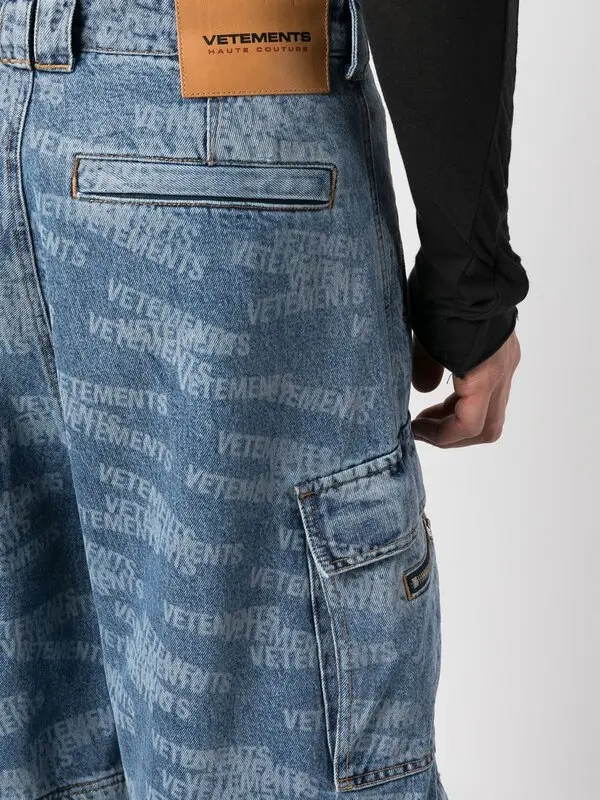 Vetements Logo-Print Transformer Jeans In Blue - 30% Off