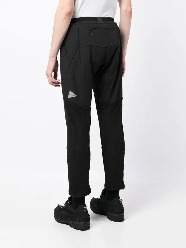 AND WANDER Fleece-panel Trousers