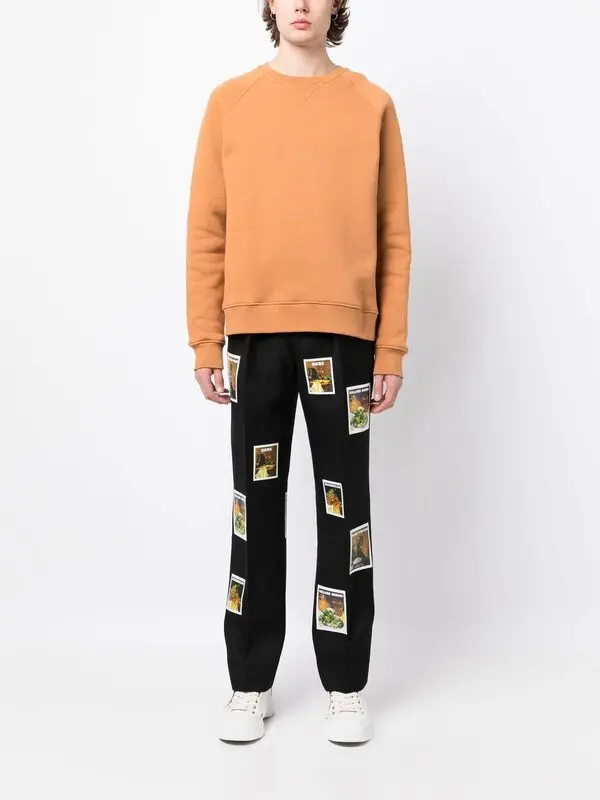 DENIM TEARS Polaroid Print Trousers
