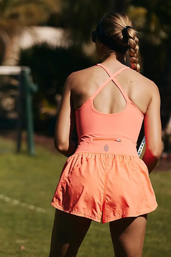 Free People Righteous Runsie - Neon Coral