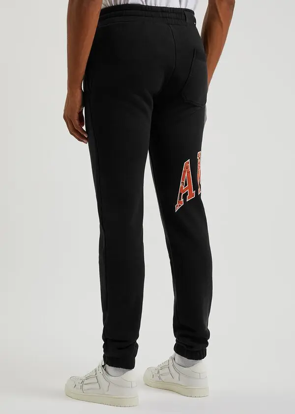 Amiri Logo-appliquéd Cotton Sweatpants