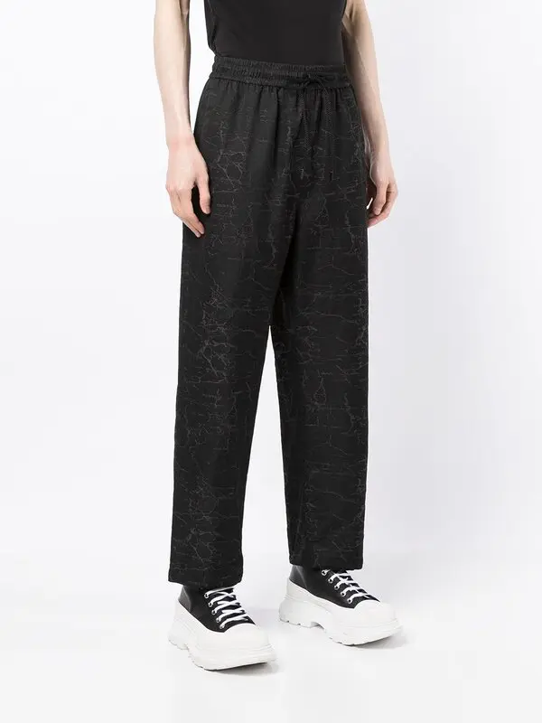 PORTS V All-over Logo Print Trousers
