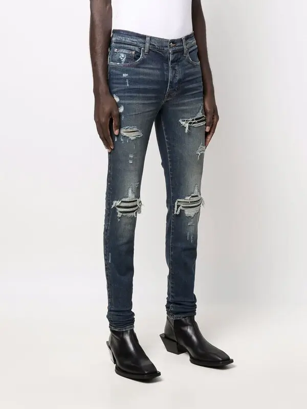 Amiri Distressed Skinny Fit Jeans - Blue | Editorialist