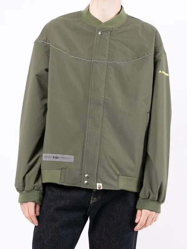 A BATHING APE® World Gone Mad Bomber Jacket