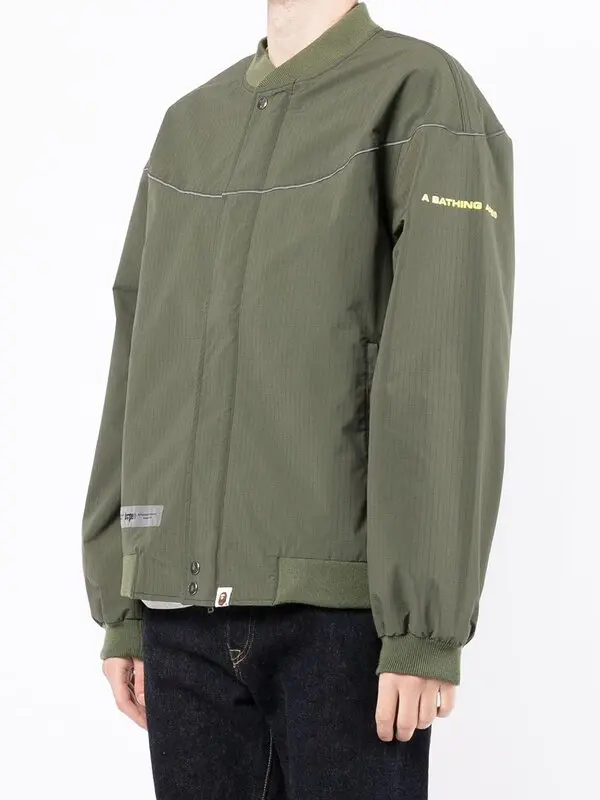 A BATHING APE® World Gone Mad Bomber Jacket