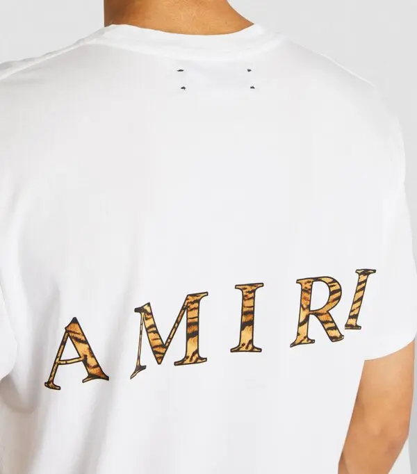 辰*孝様 売り切り価格　AMIRI ホワイト ロゴTシャツ AMIRI logo-print Cotton T-shirt | White | FARFETCH