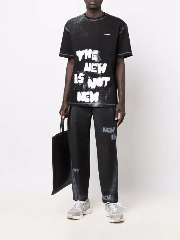 ADER ERROR Slogan Print Trousers