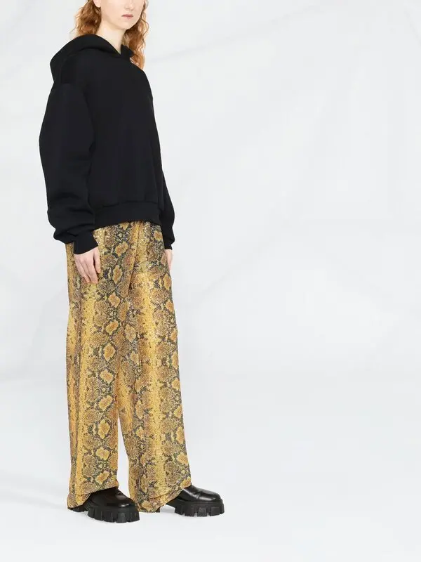 Gcds Snakeskin Print Trousers - Yellow