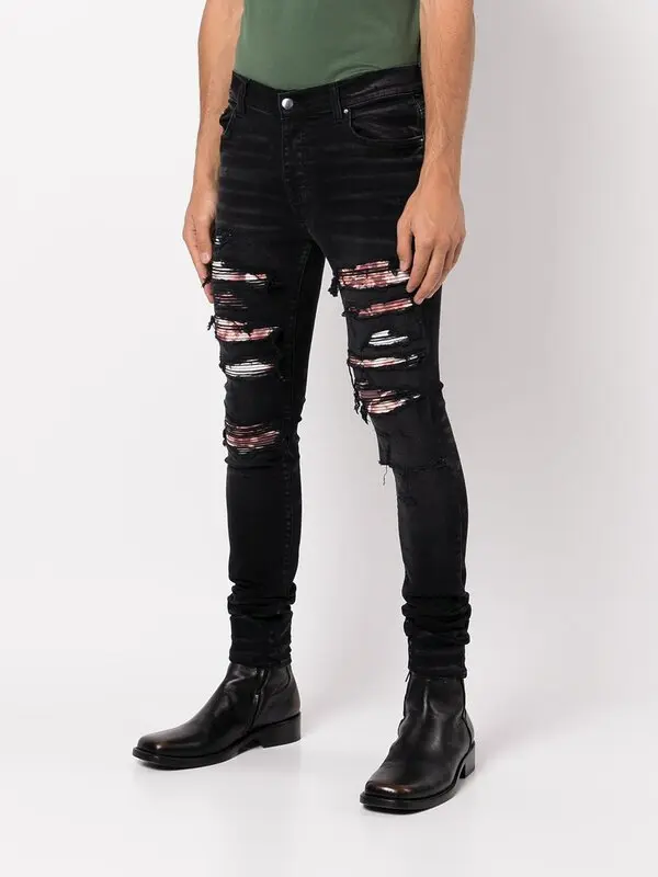 Amiri Ripped Skinny Jeans
