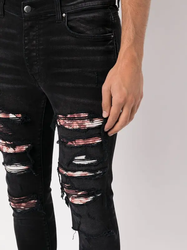 Amiri Ripped Skinny Jeans