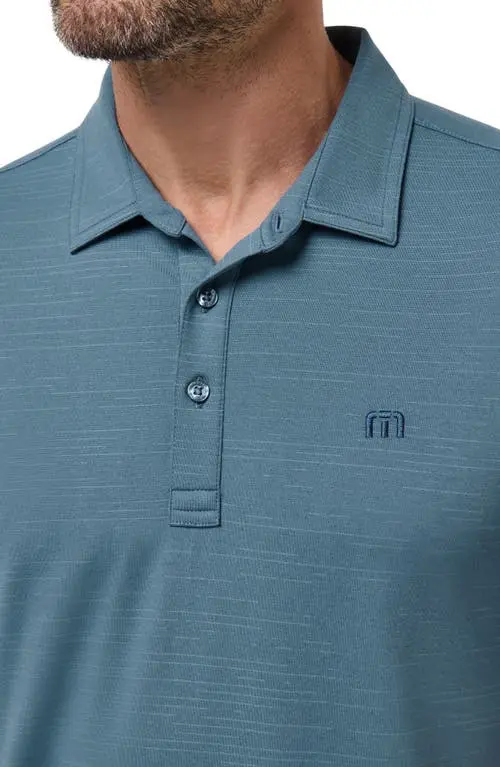 Travis Mathew The Heater Solid Short Sleeve Performance Polo - Copen Blue