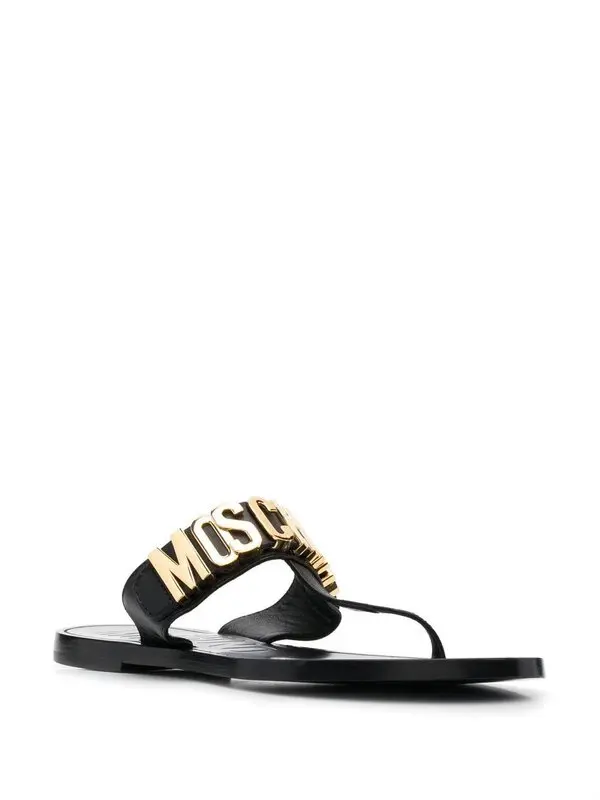 Moschino Logo Plaque Flat Sandals In Black - 50% Off