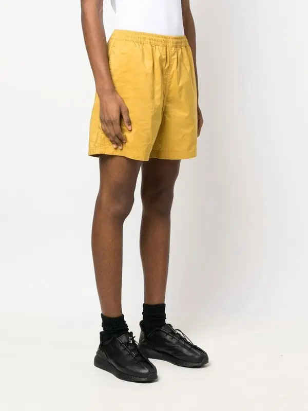 PLEASURES Embossed Logo Bermuda Shorts