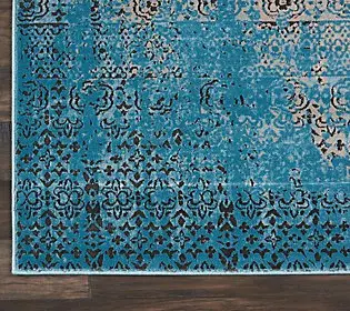 NOURISON HOME Karma Blue 6'7' X 9'6' Area Rug