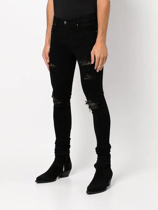 Amiri Ripped-detail Denim Jeans