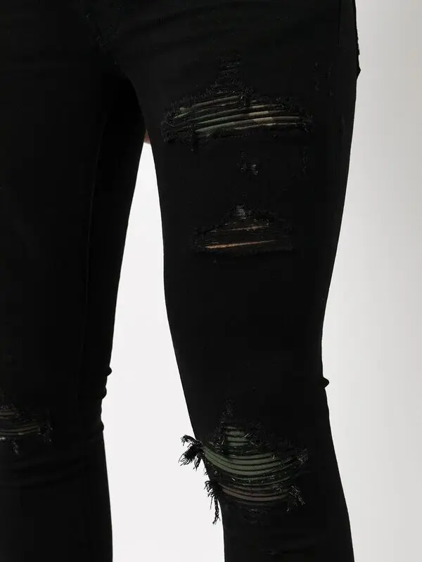 Amiri Ripped-detail Denim Jeans