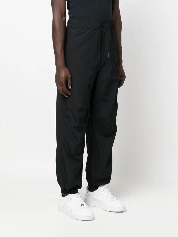 COUNTY OF MILAN Marcelo Burlon Drawstring-fastening Waistband Trousers