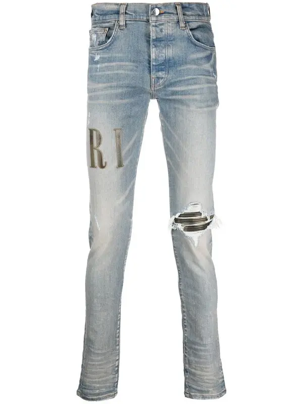 Amiri Logo-print Distressed Skinny Jeans - Blue