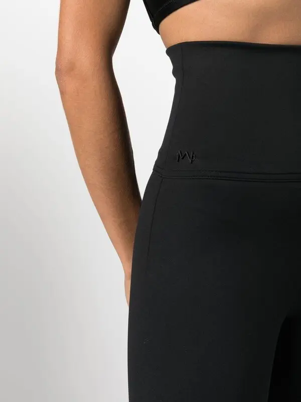 THE MANNEI High-waisted Flared Trousers With Side Slits
