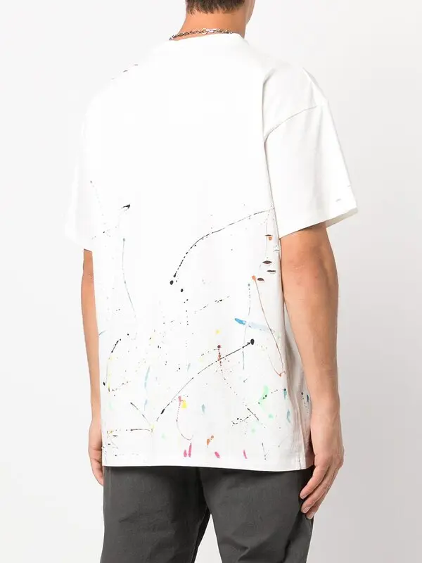 MOSTLY HEARD RARELY SEEN Warped-text Paint T-shirt - White
