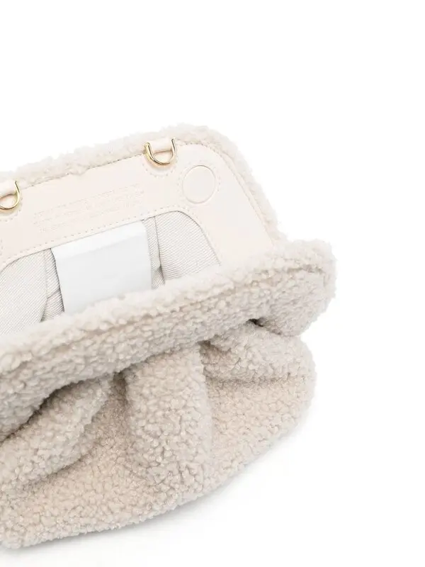 THEMOIRE Gea Textured Clutch Bag