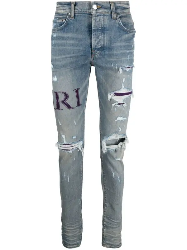 Amiri Ripped-knee Logo-print Skinny Jeans - Blue