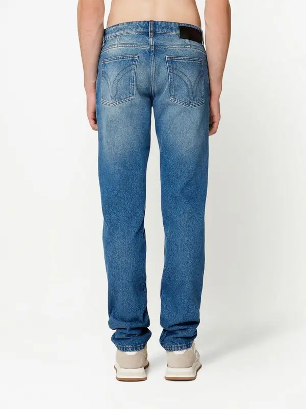 AMI Paris Tapered-leg Jeans