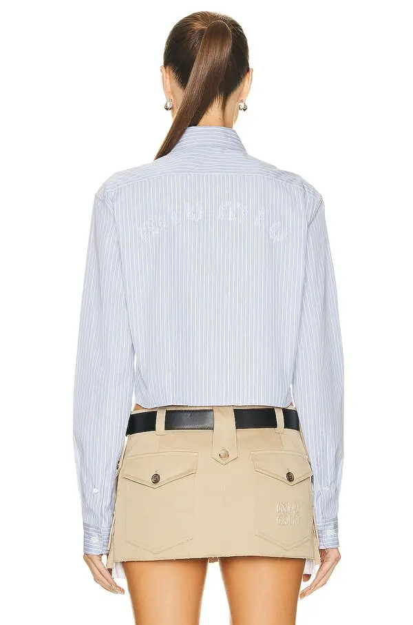 Miu Miu Cropped Long Sleeve Top In Blue - Celeste | Editorialist