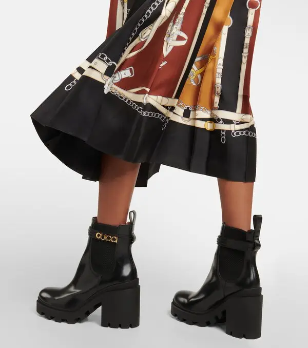 Gucci Logo Leather Chelsea Boots - Black | Editorialist display picture 1