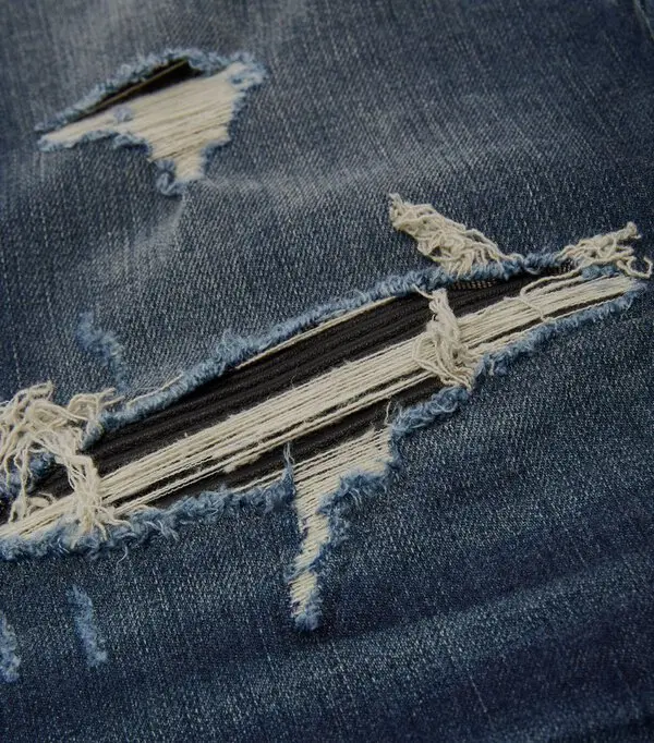 Amiri Distressed Slim Jeans