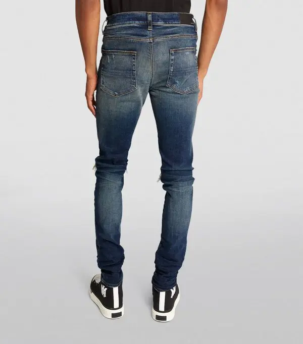 Amiri Distressed Slim Jeans