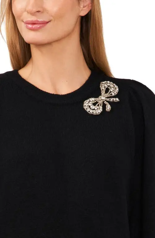 CECE DUPRAZ Rhinestone Bow Appliqué Juliet-sleeve Sweater
