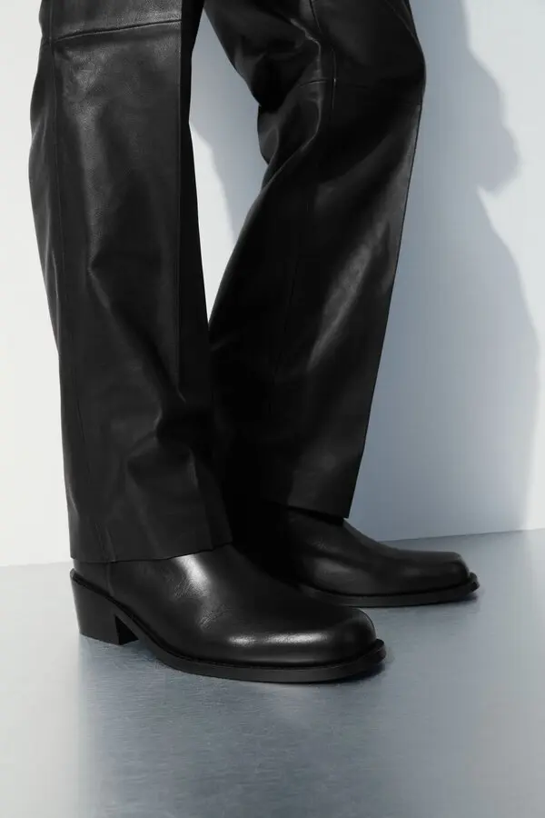knee length dresses for ladies SLIM BLACK LEATHER  Jacques Solovire Paris