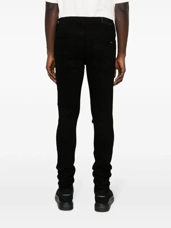 Amiri Logo-patch Ripped Skinny Jeans - Black