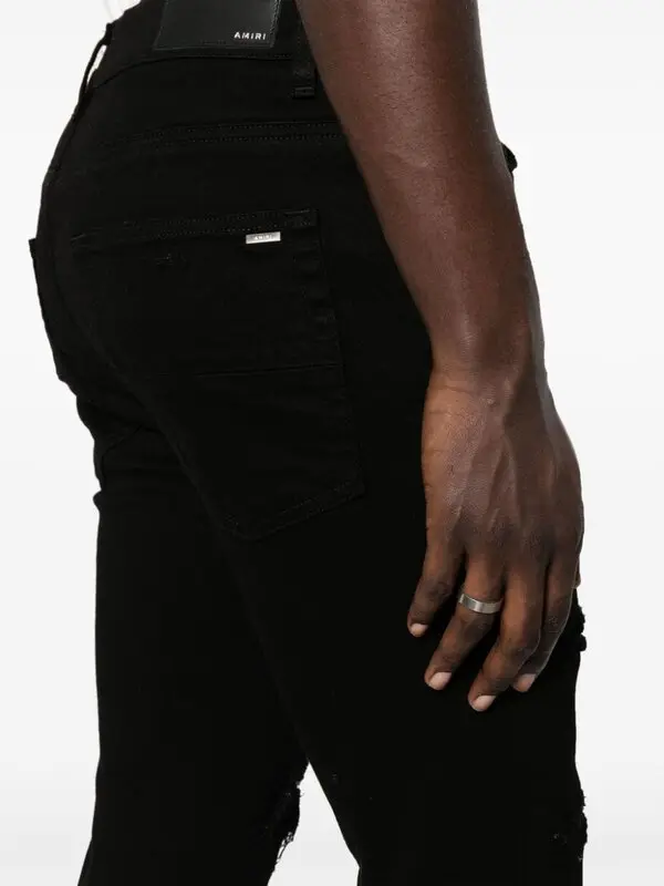 Amiri Logo-patch Ripped Skinny Jeans - Black