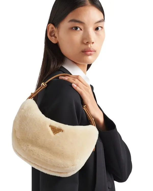 Prada Arqué Shearling And Leather Shoulder Bag - Neutral