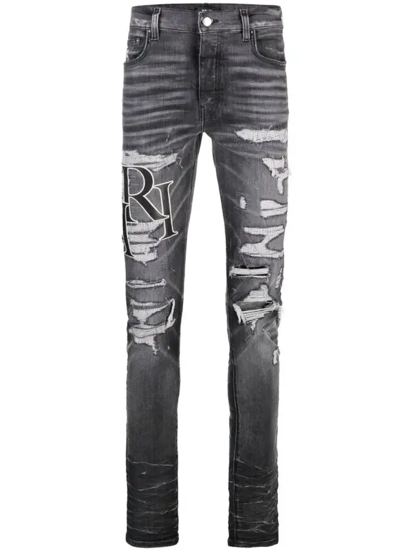 Amiri Staggered Skinny Jeans