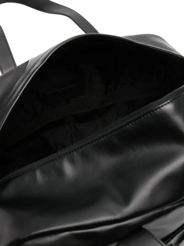 Diesel® Logo-Debossed Travel Bag In Black - 50% Off | Editorialist