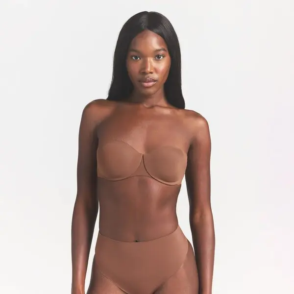 SKIMS Unlined Strapless Bra | Medium Neutral | | Smoothing Intimates
